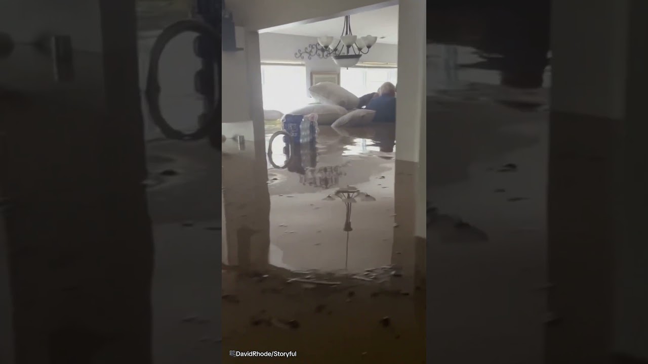 Hurricane Helene forces neighbors to stand in chest-deep water after North